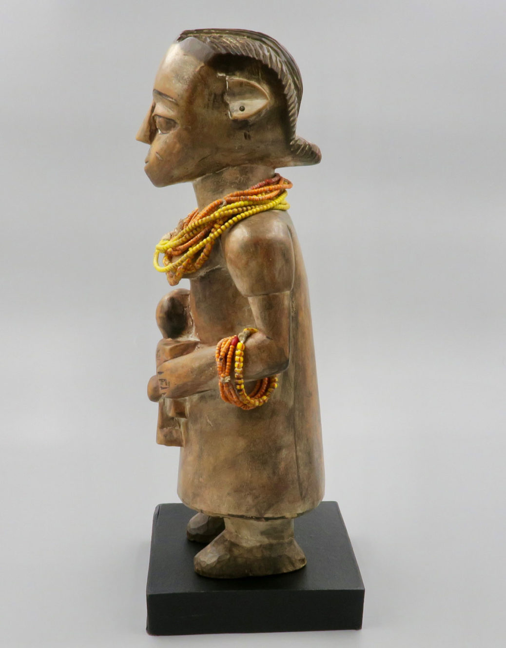 Ewe, Togo statue, wood, traces of polychromy and pearls | Galerie Agama